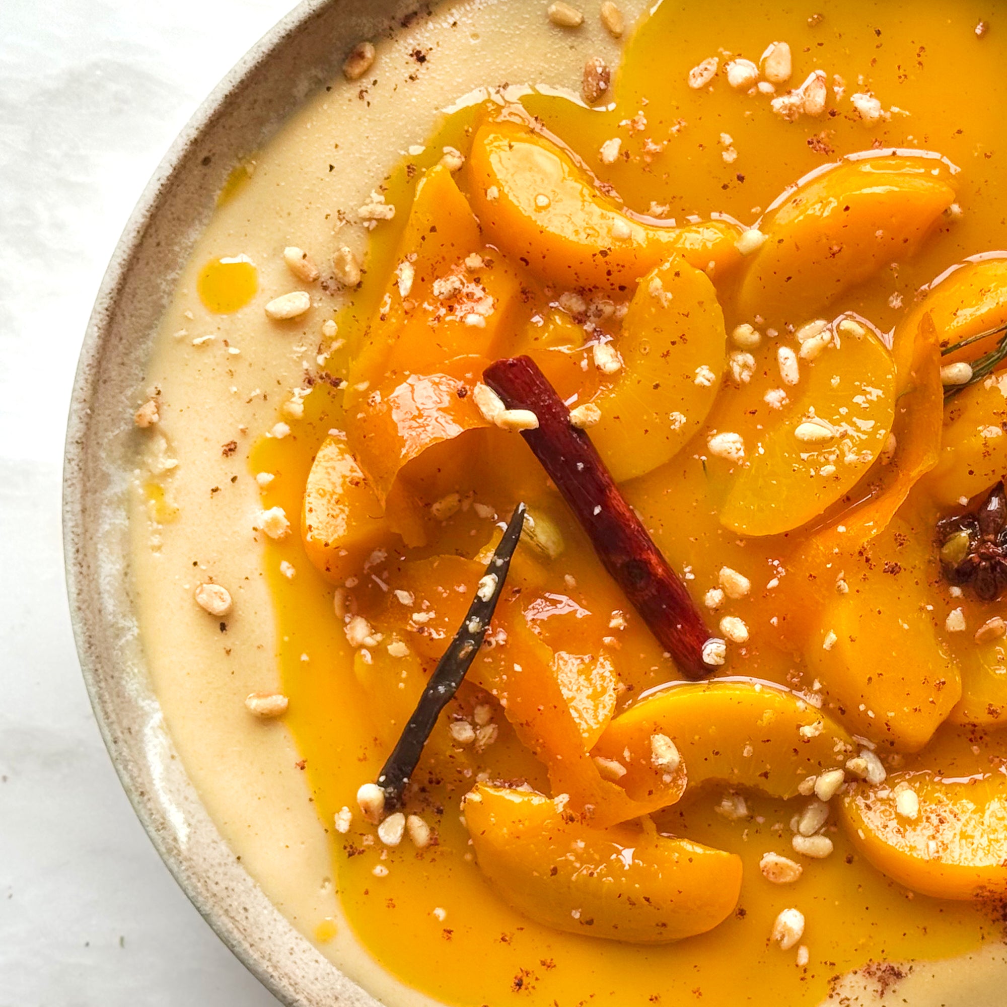 Orange semolina custard with spiced peach syrup | Ottolenghi Recipes